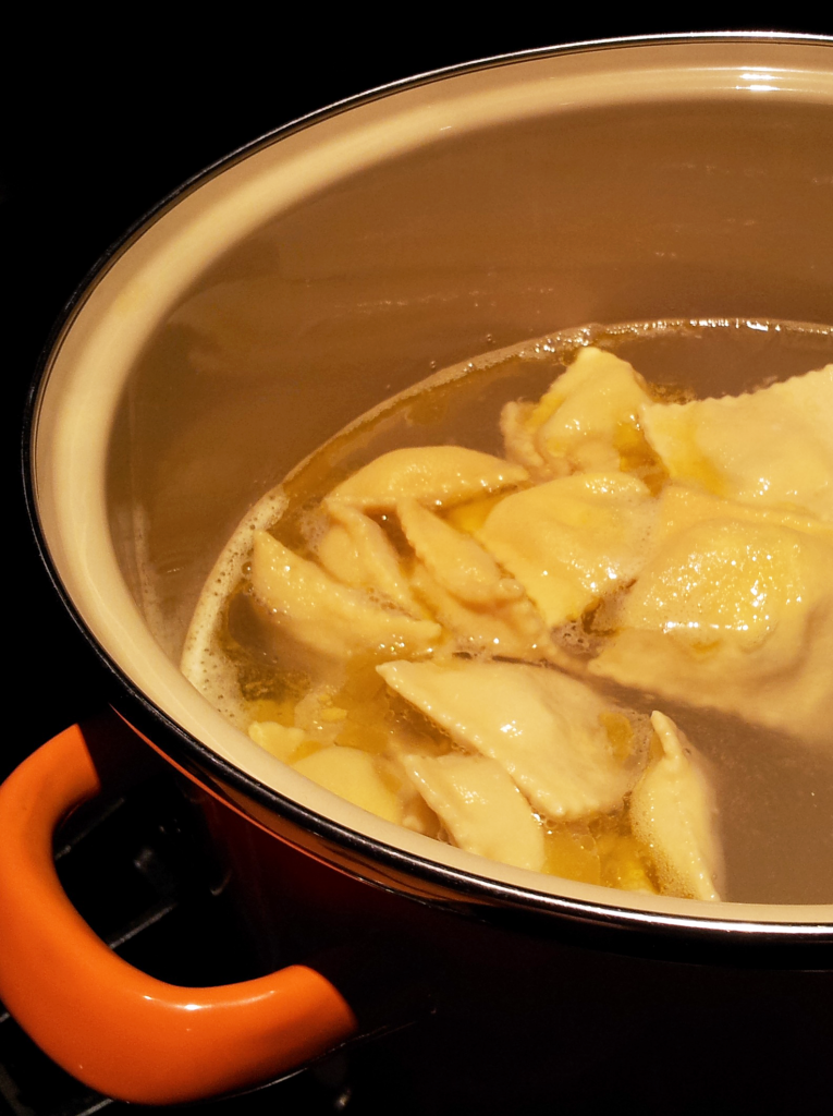 Tomato and Cream Sauce Over Hand Stuffed Parsley and Ricotta Ravioli